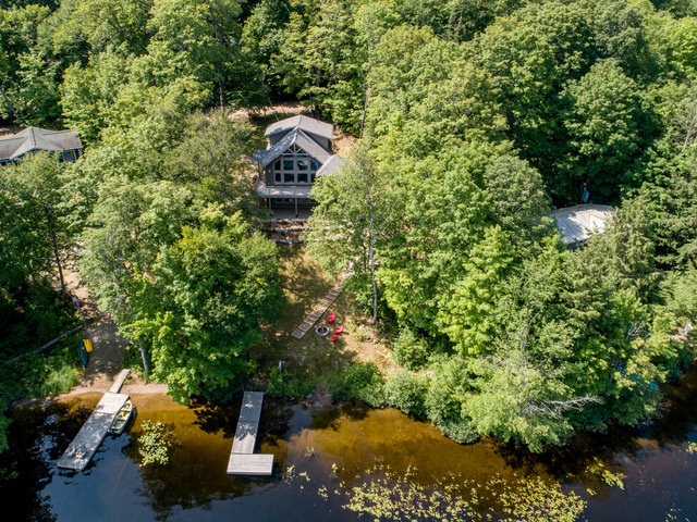 Striking new build nestled on the shores of Ril Lake ~ Rick Wearing ...