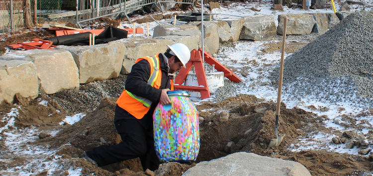 See you in 40 years: time capsule containing community memories buried beneath Kent Park ...
